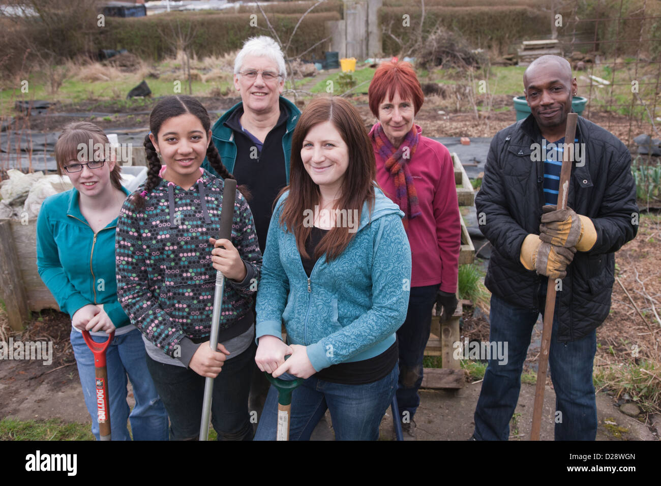 Portrait of gardening group on an allotment Stock Photo - Alamy