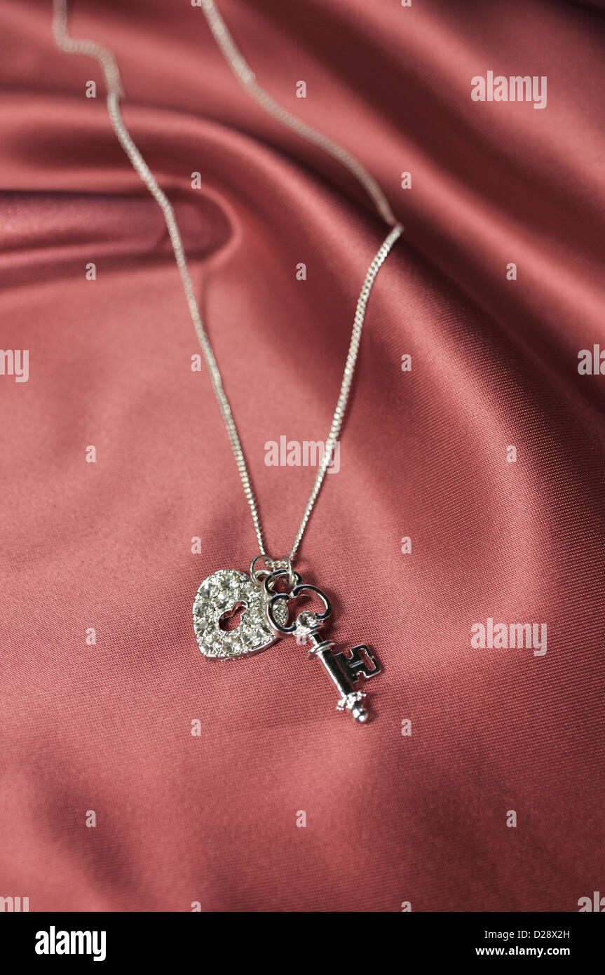 Chain and pendant - lock and key Stock Photo - Alamy