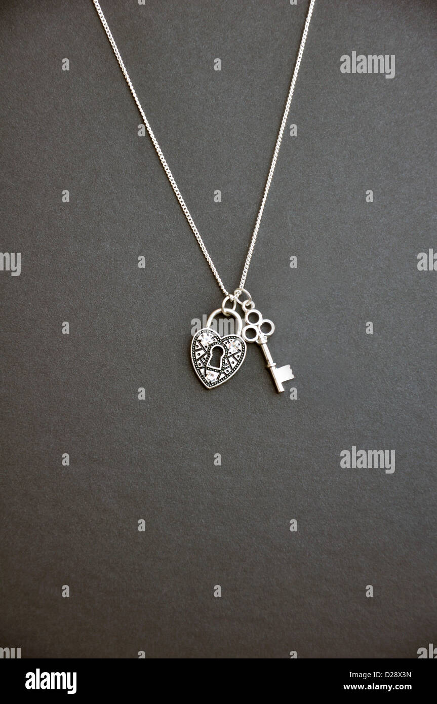 Chain and pendant - lock and key Stock Photo - Alamy