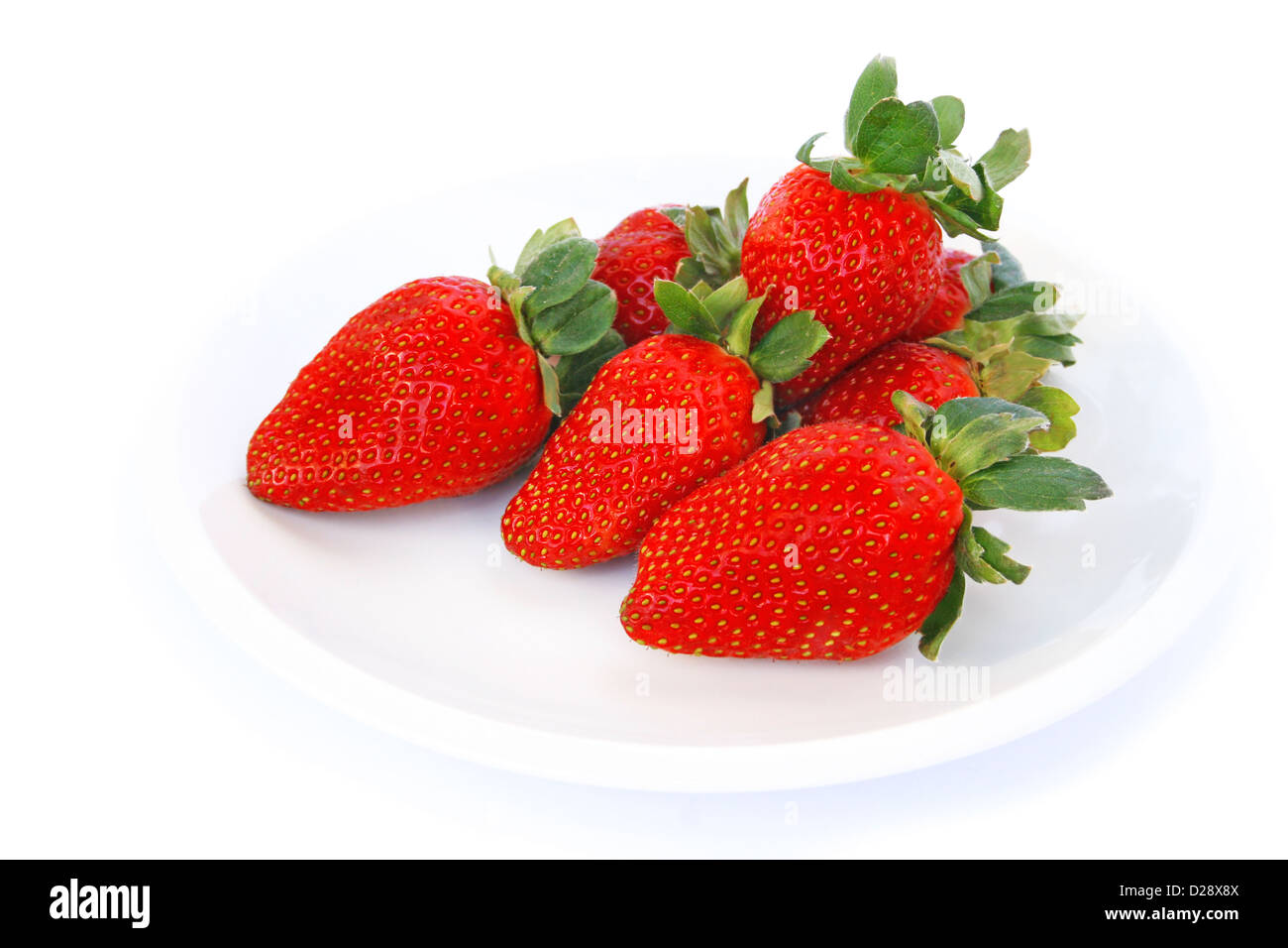 Strawberries in plate isolated on white background Stock Photo - Alamy