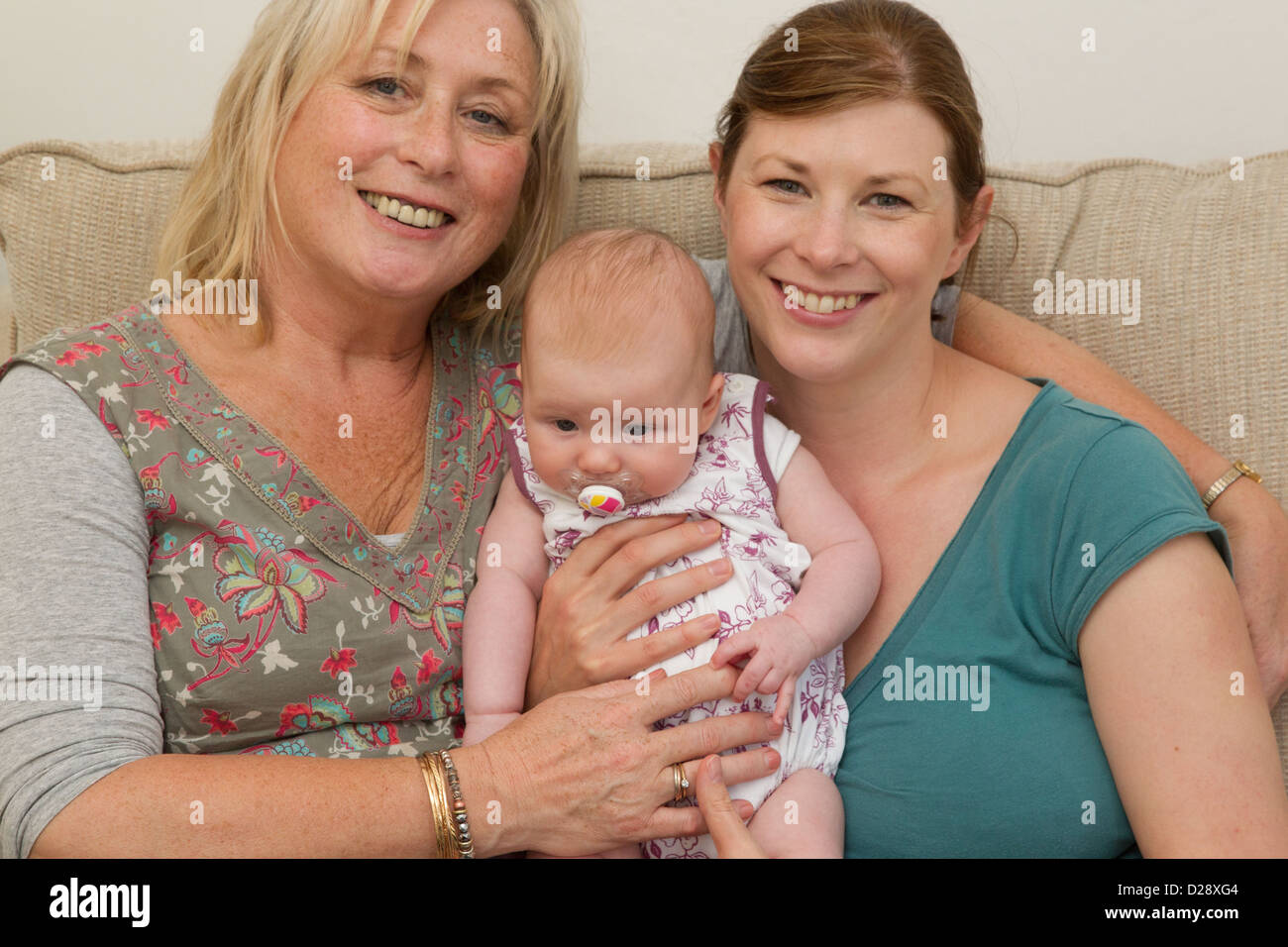Three generations of a family Stock Photo - Alamy