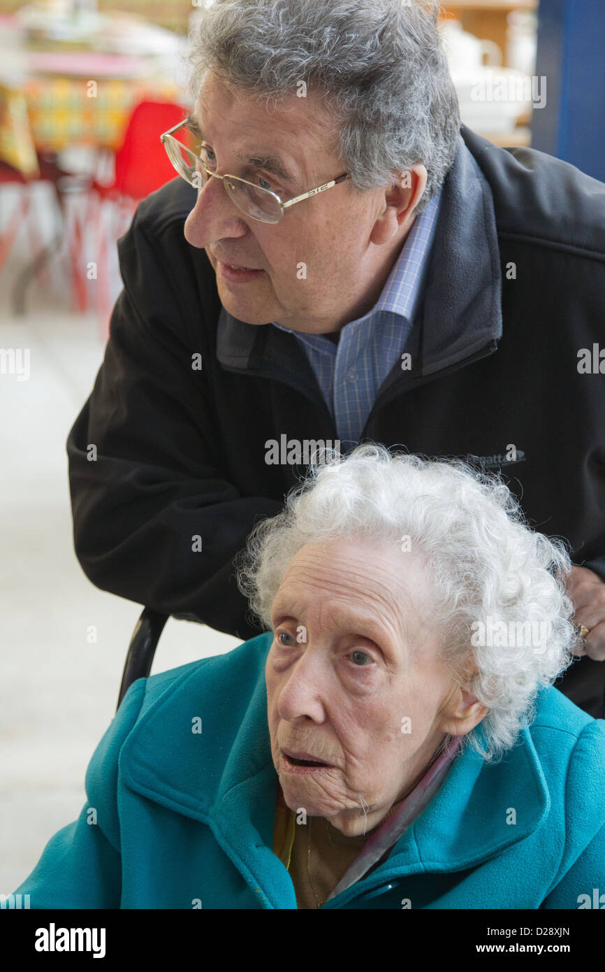 Visually impaired people with carers on outing to Denby Pottery ...