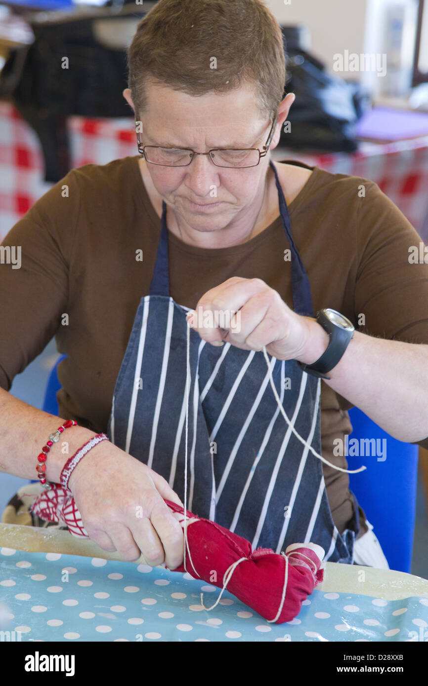 Felt making class for people with a visual impairment - tying felt in a ...
