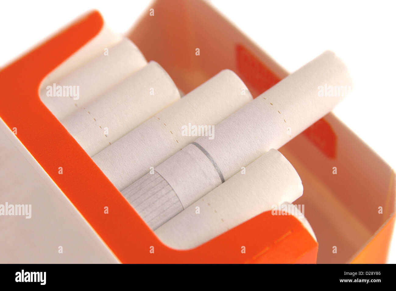 Close-up orange cigarette box on a white background Stock Photo - Alamy