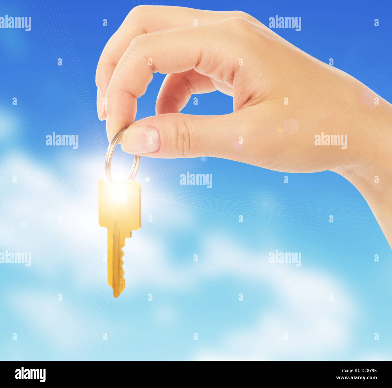 hand holds a gold key Stock Photo - Alamy