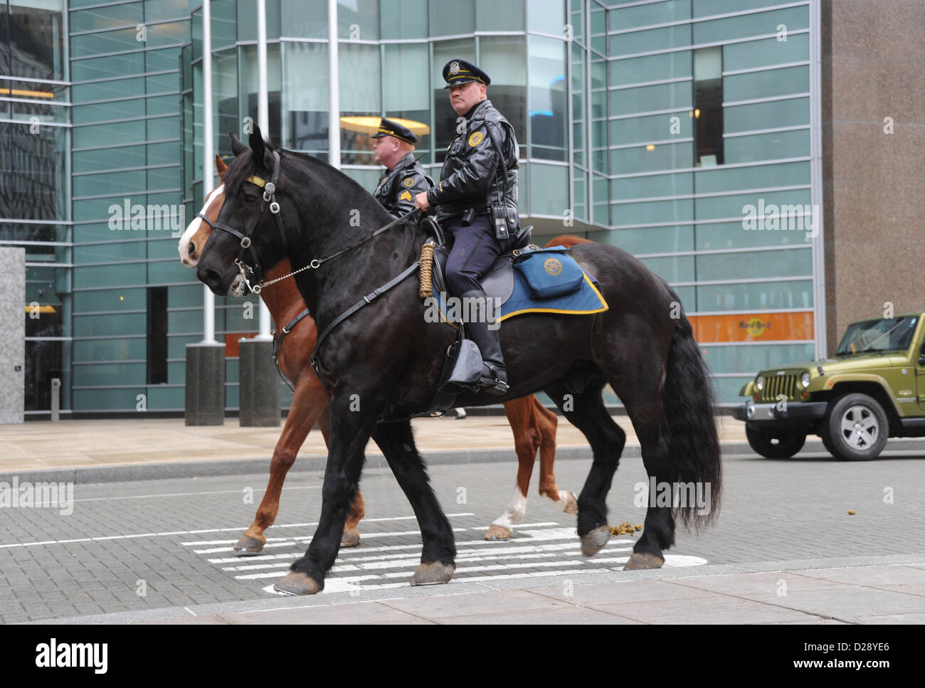 Two mounted police officers patrol the streets in Detroit, USA, 13 ...