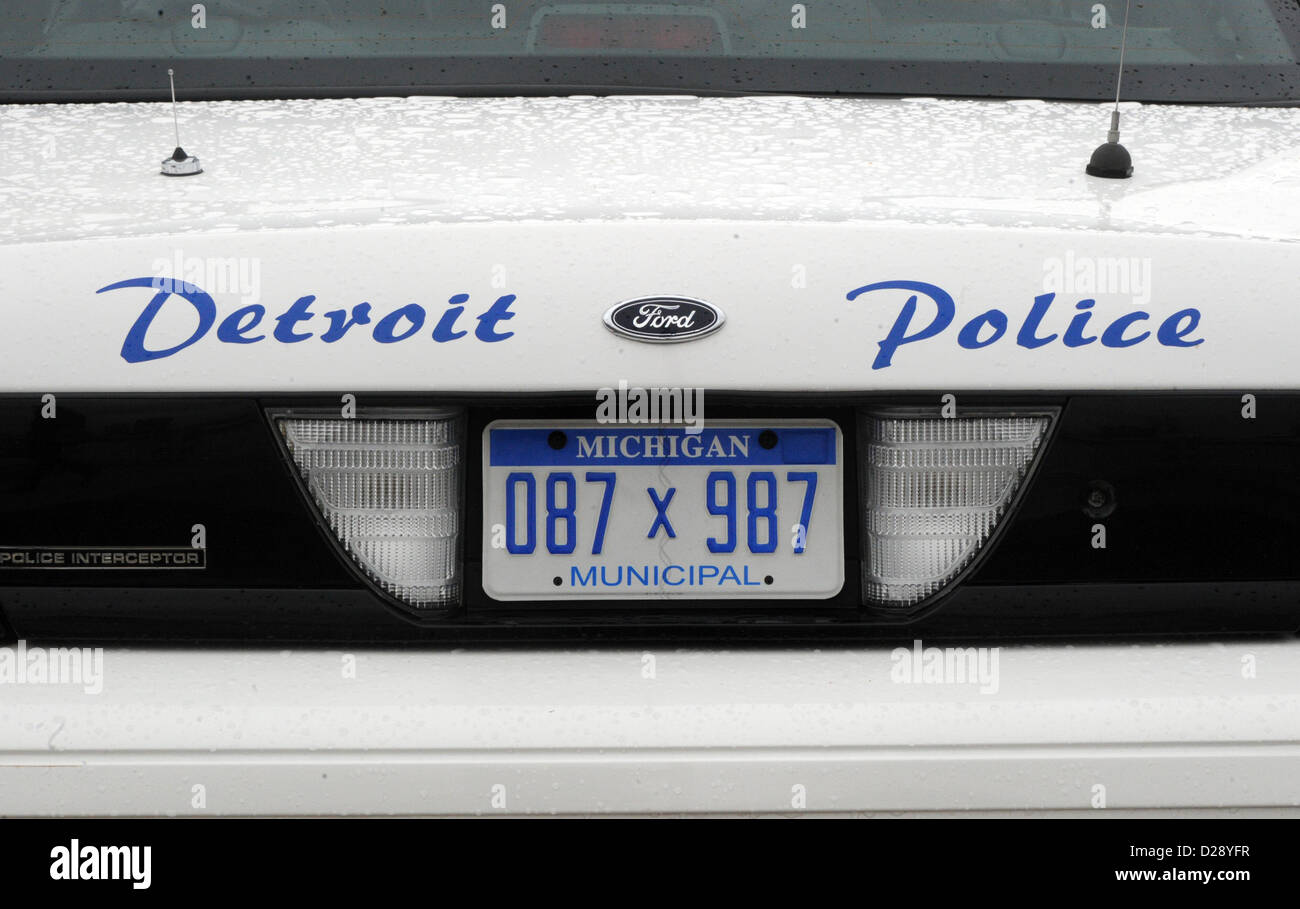 The boot of Detroit police vehicle is covered in rain drops in Detroit ...