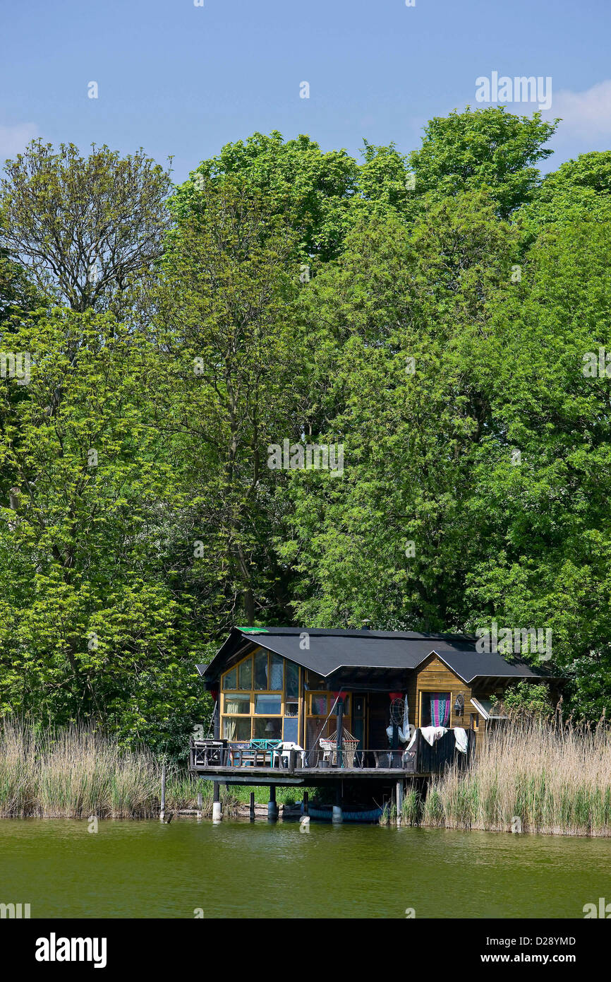 Idyllic house at the canal in the f Stock Photo - Alamy