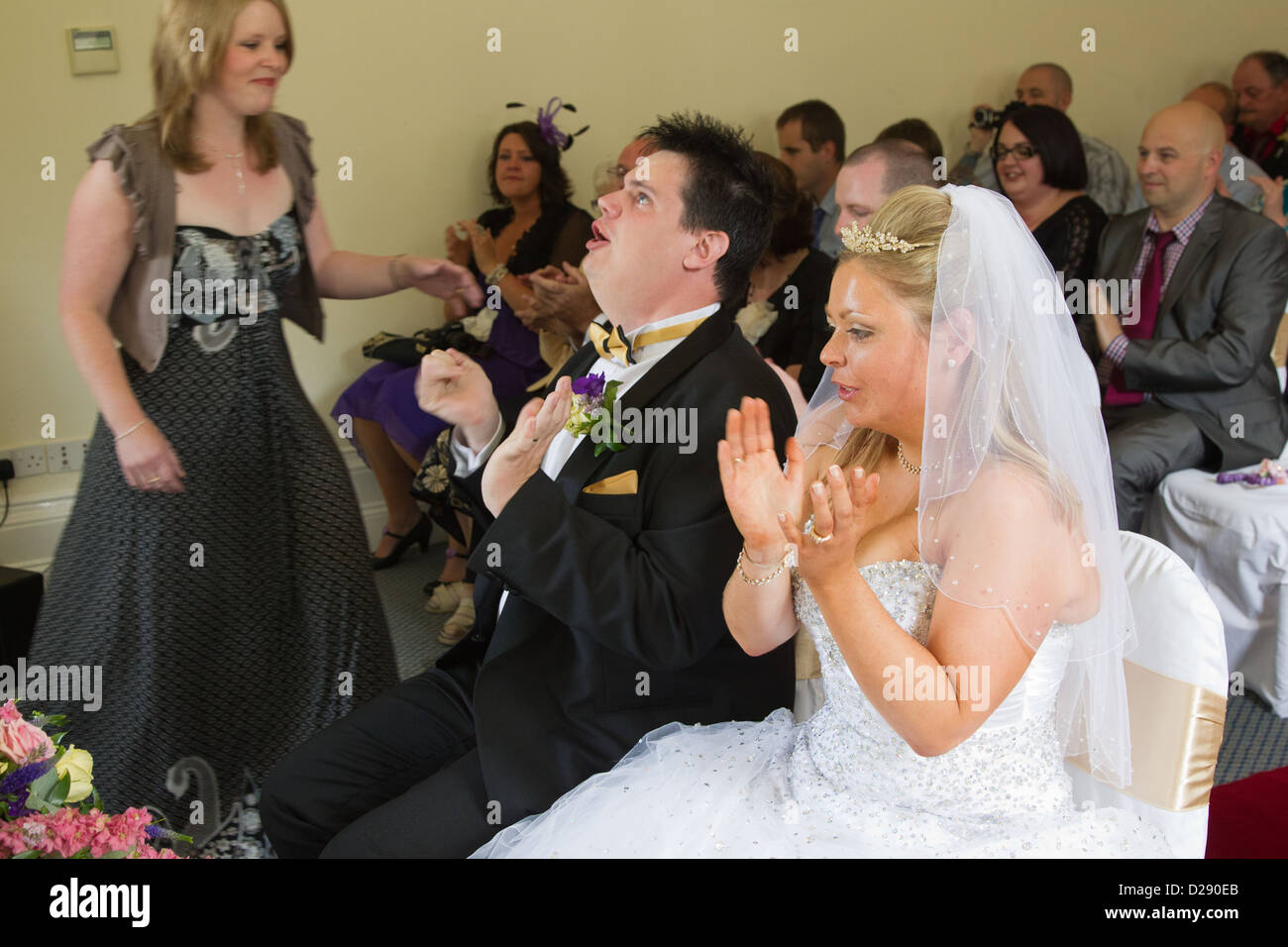 Visually impaired bride and groom at wedding Stock Photo - Alamy