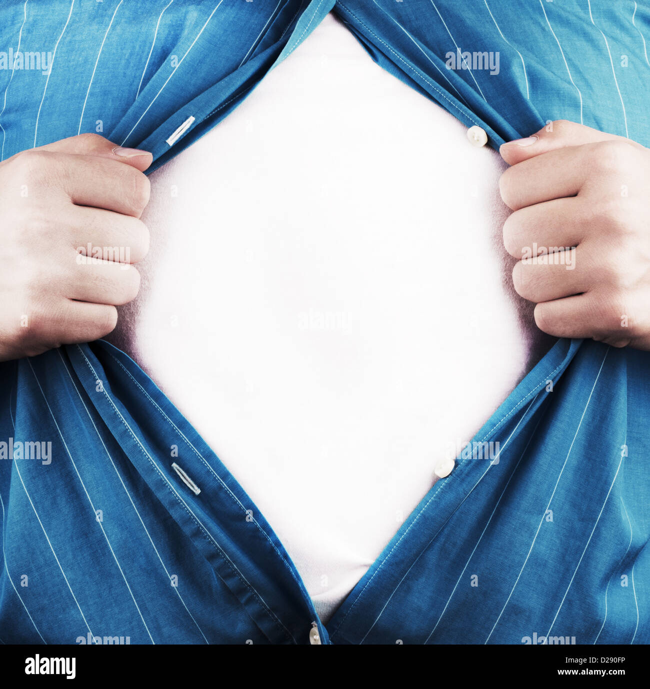 Business man tearing off his shirt Stock Photo - Alamy