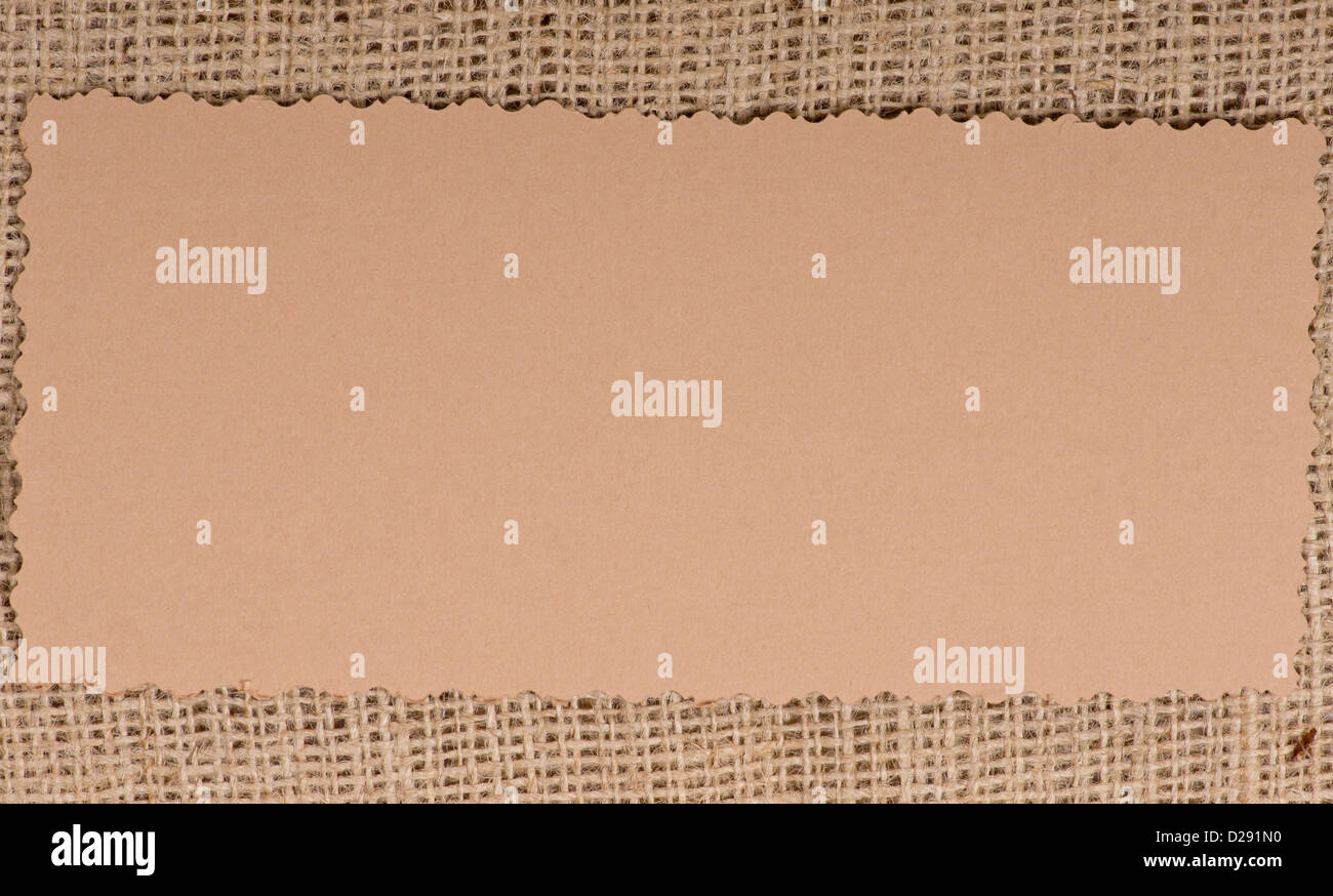 Old paper tag on natural burlap Stock Photo - Alamy