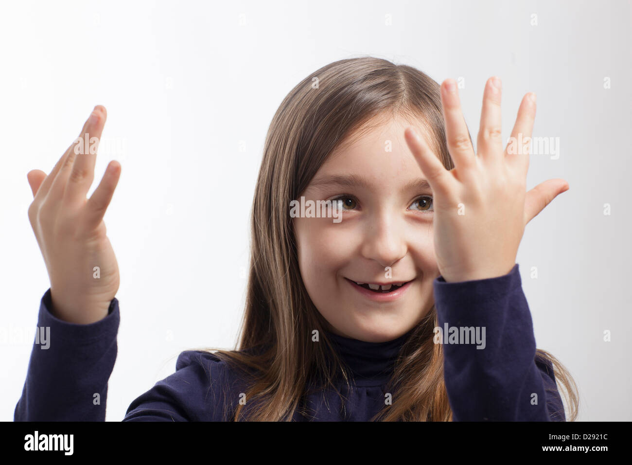 young girl using fingers to count Stock Photo - Alamy