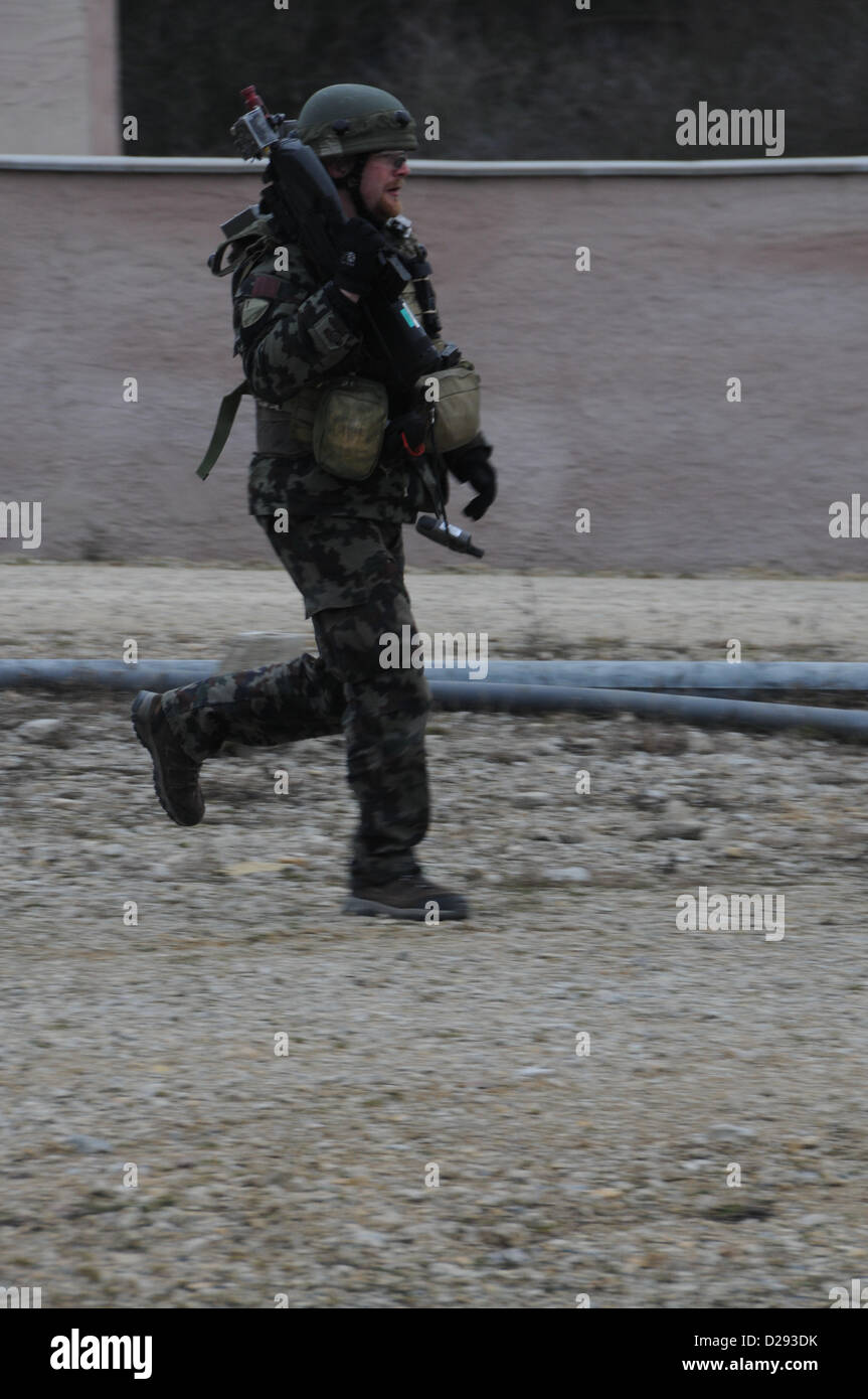 A Slovenian army soldier of the 1st Motorized Brigade pulls security ...