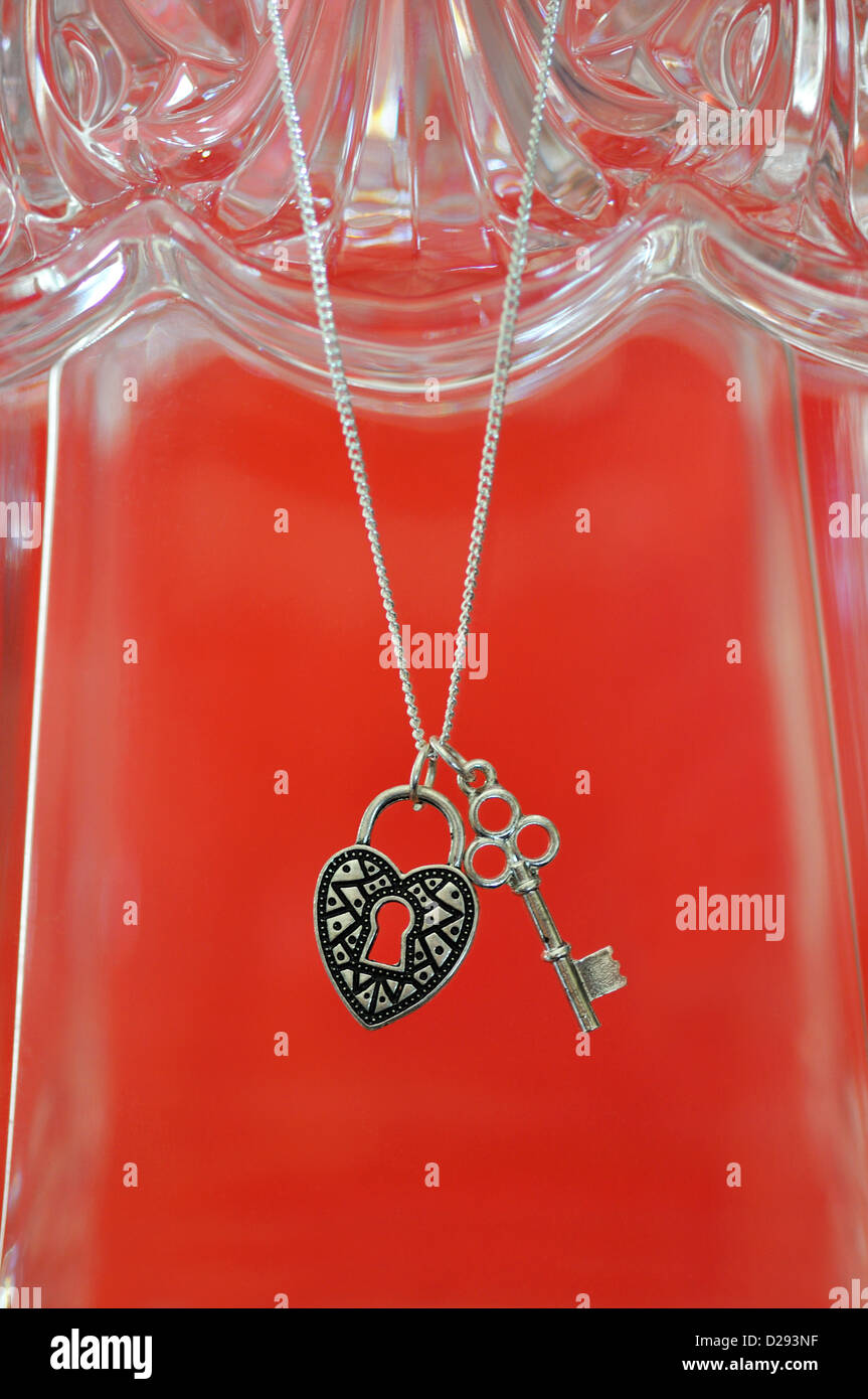 Chain and pendant - lock and key Stock Photo - Alamy