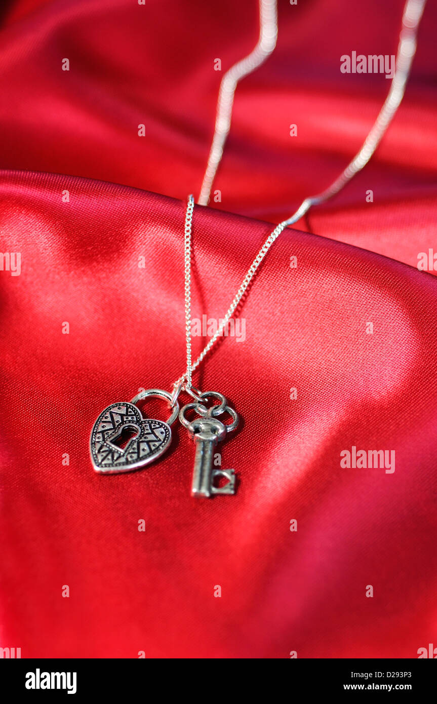 Chain and pendant - lock and key Stock Photo - Alamy