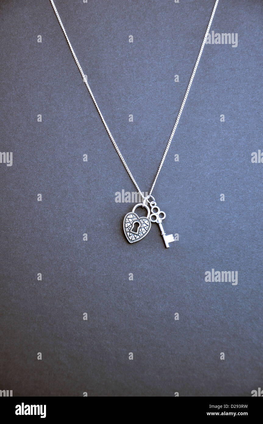 Chain and pendant - lock and key Stock Photo - Alamy