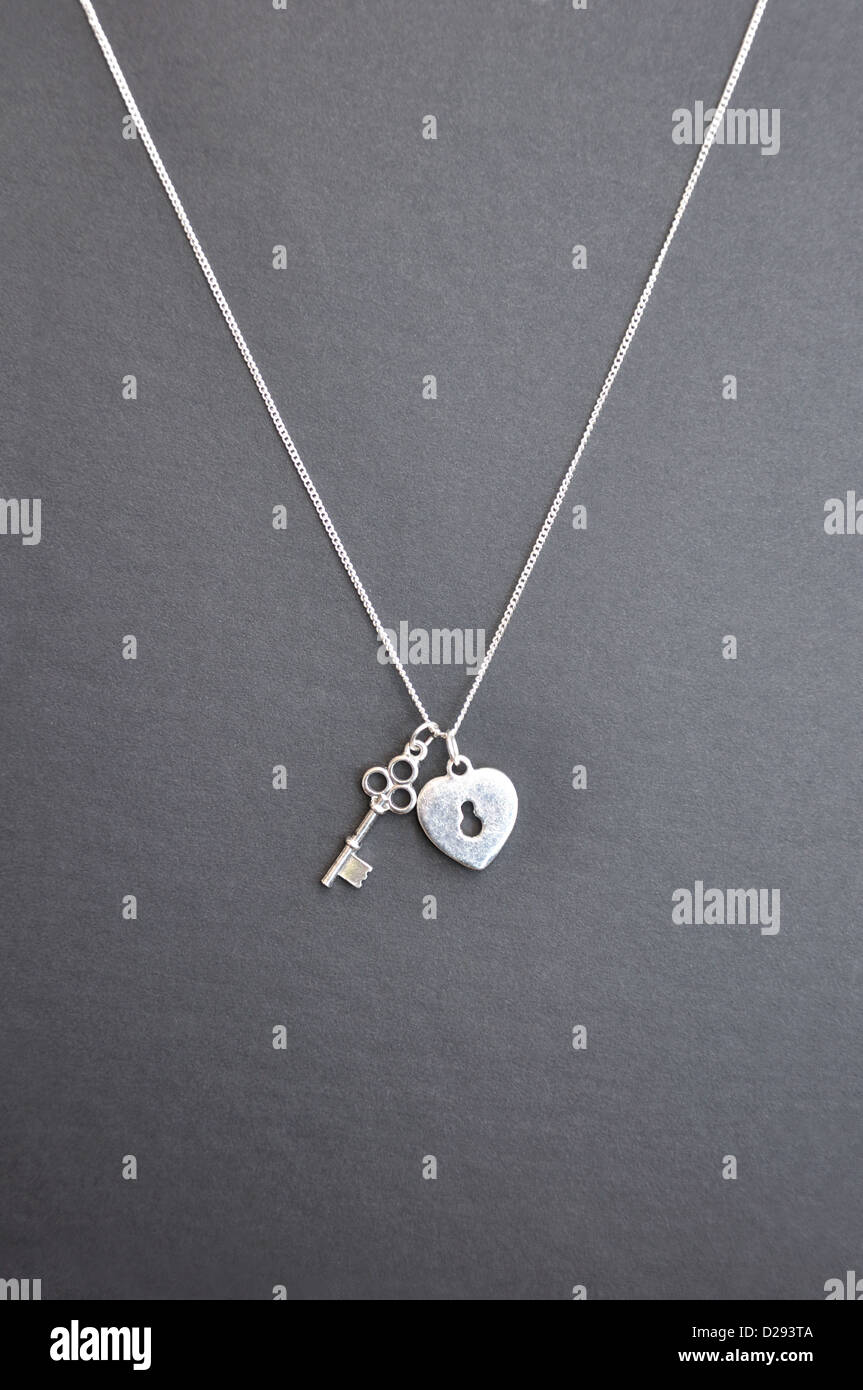 Chain and pendant - lock and key Stock Photo - Alamy