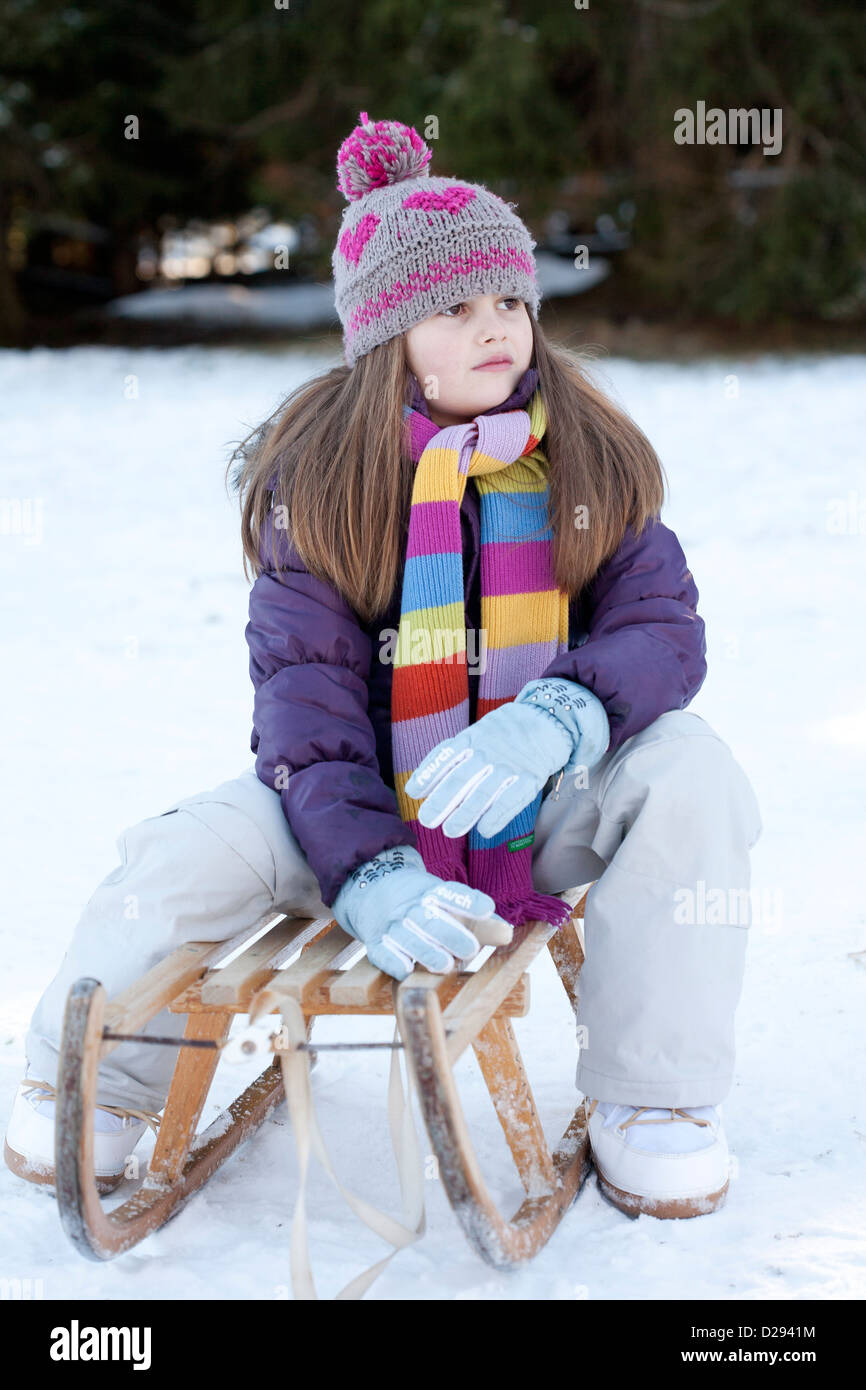 Girls With Sleds High Resolution Stock Photography and Images - Alamy