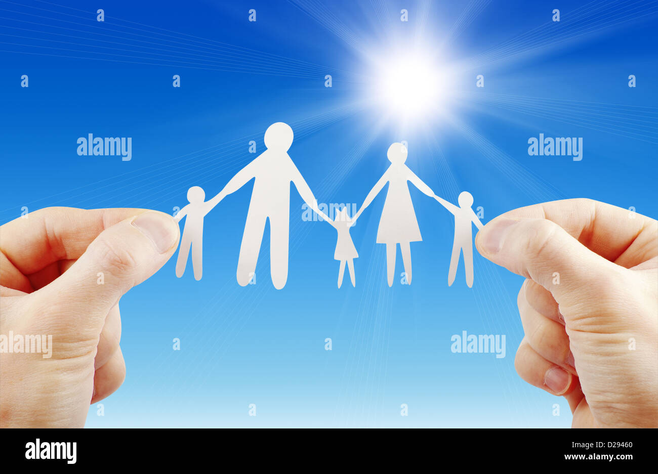 paper family in hands Stock Photo - Alamy