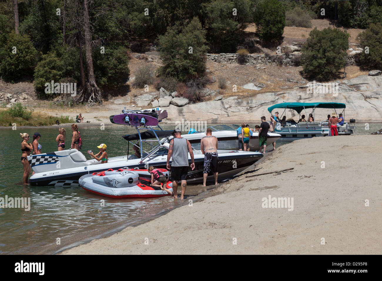 Boaters partying on the beach at Bass Lake California, USA Stock Photo ...