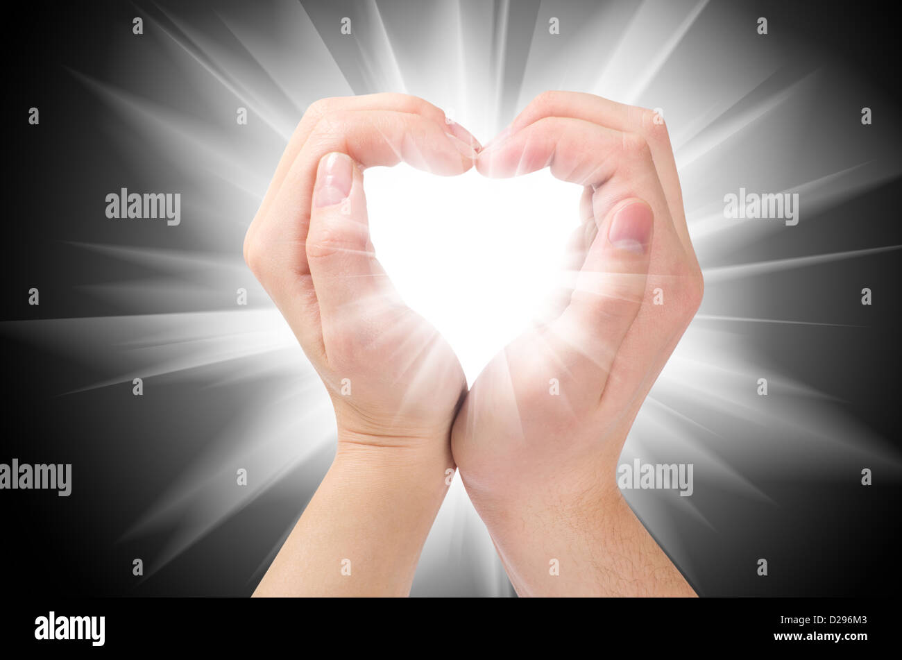 Two hands form a heart shape with their fingers Stock Photo - Alamy