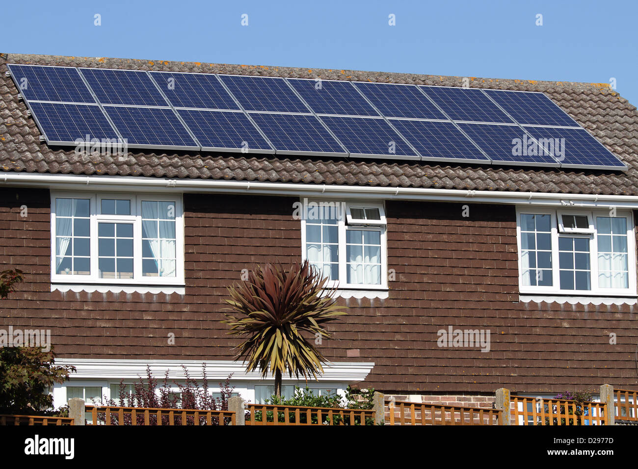 Solar photovoltaic panels on house roof Stock Photo - Alamy