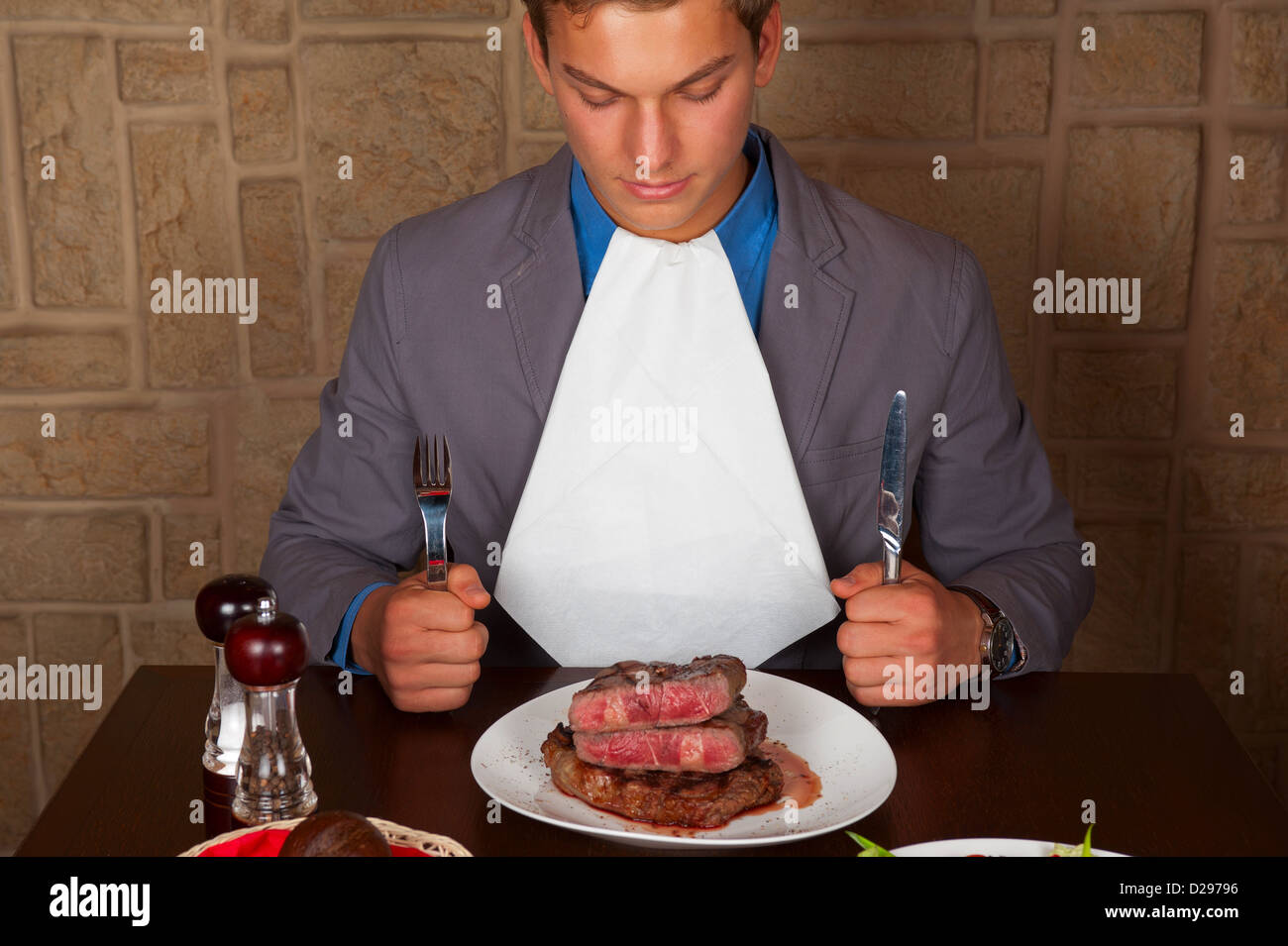eat a beef steak Stock Photo - Alamy