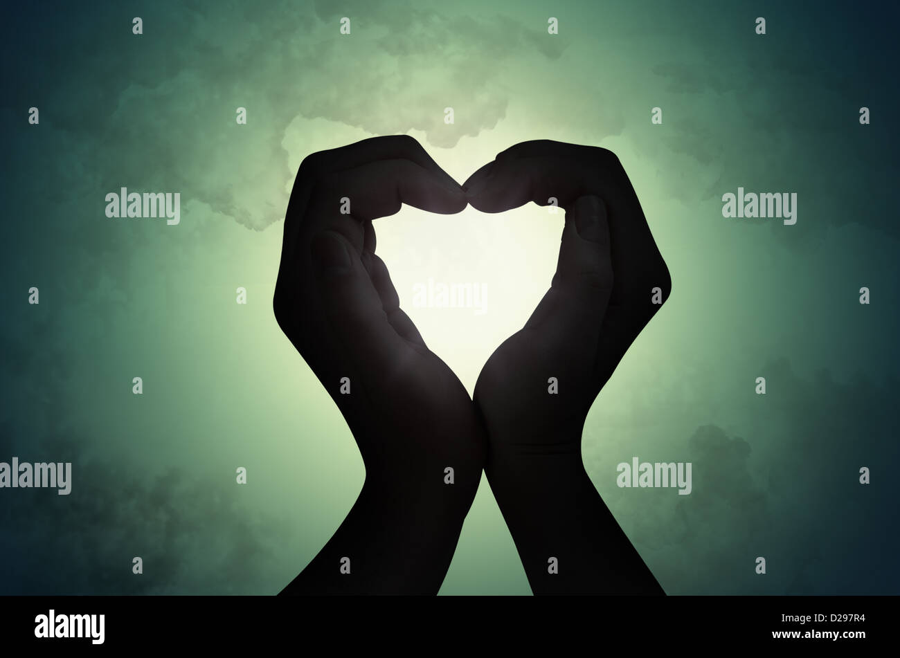 love shape hand silhouette in sky Stock Photo - Alamy