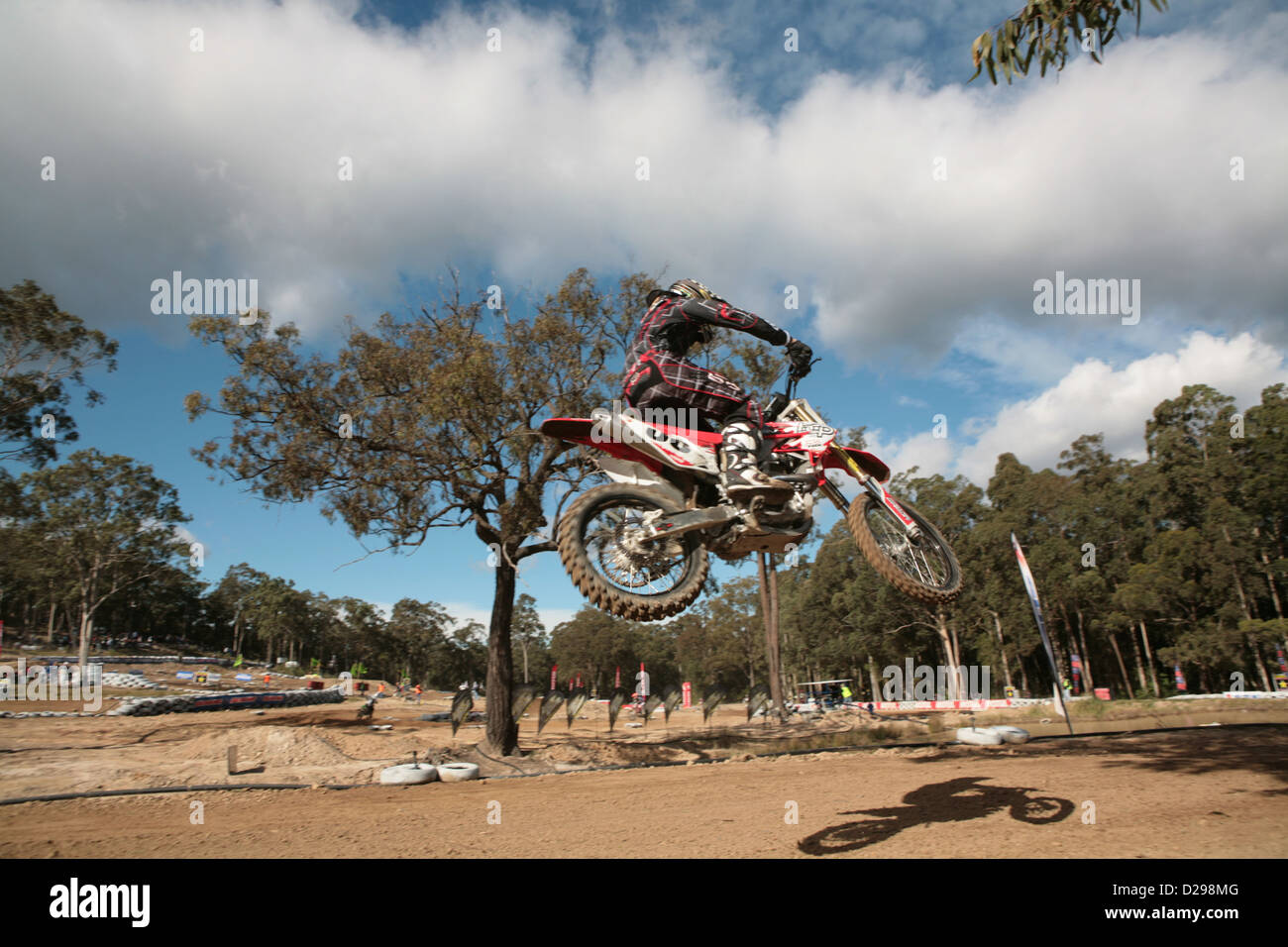 Motor X JUMPING HIGH ON THE BIKE Stock Photo - Alamy