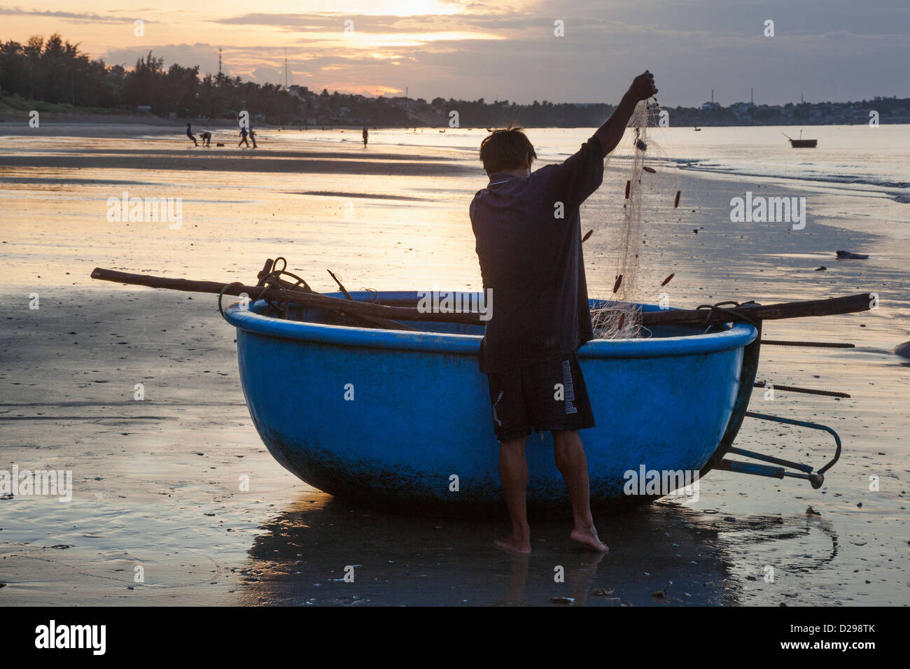Vietnam, Mui Ne, Mui Ne Beach, Fisherman and Coracle Fishing Boat Stock ...