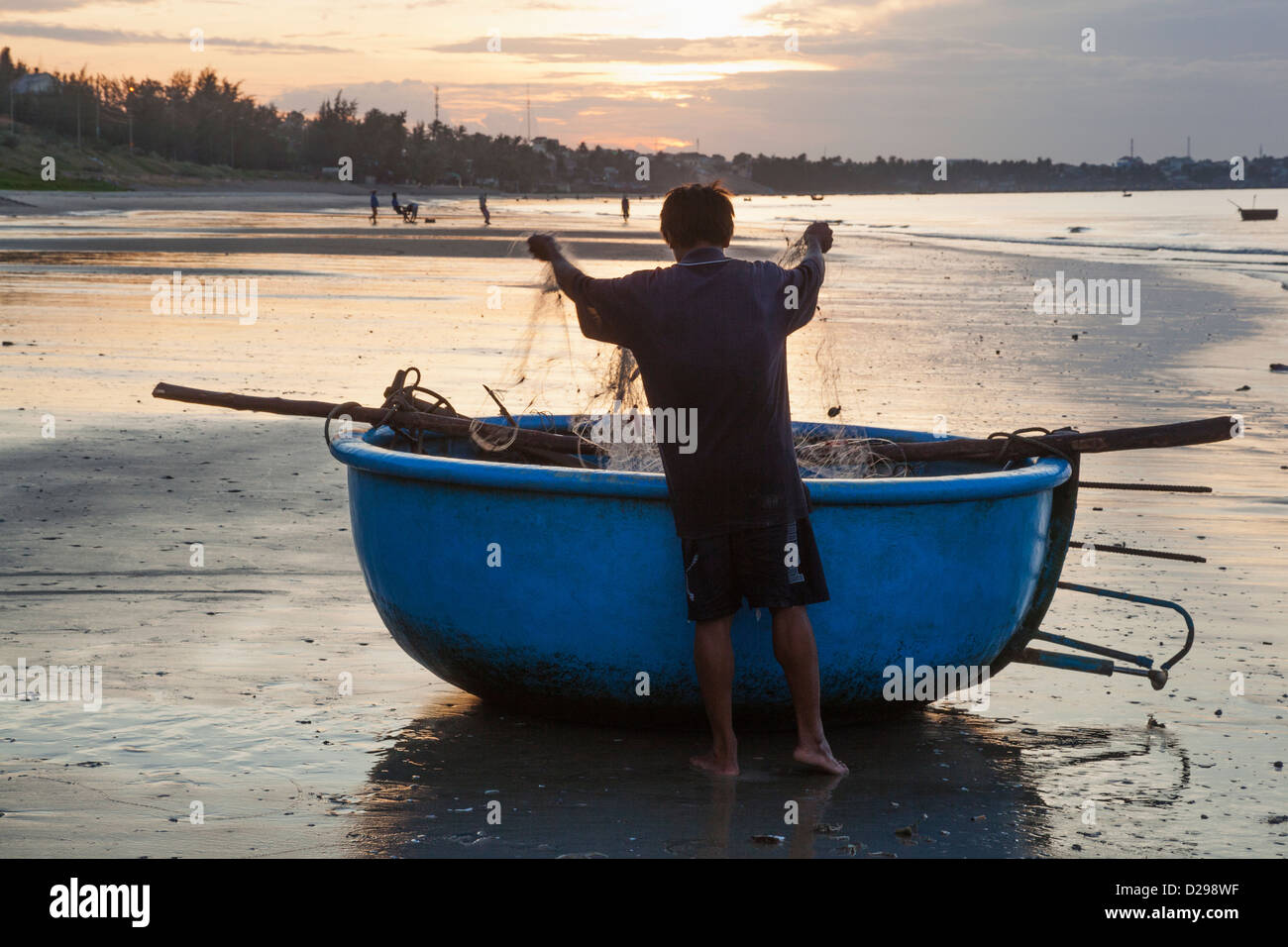 Vietnam, Mui Ne, Mui Ne Beach, Fisherman and Coracle Fishing Boat Stock ...