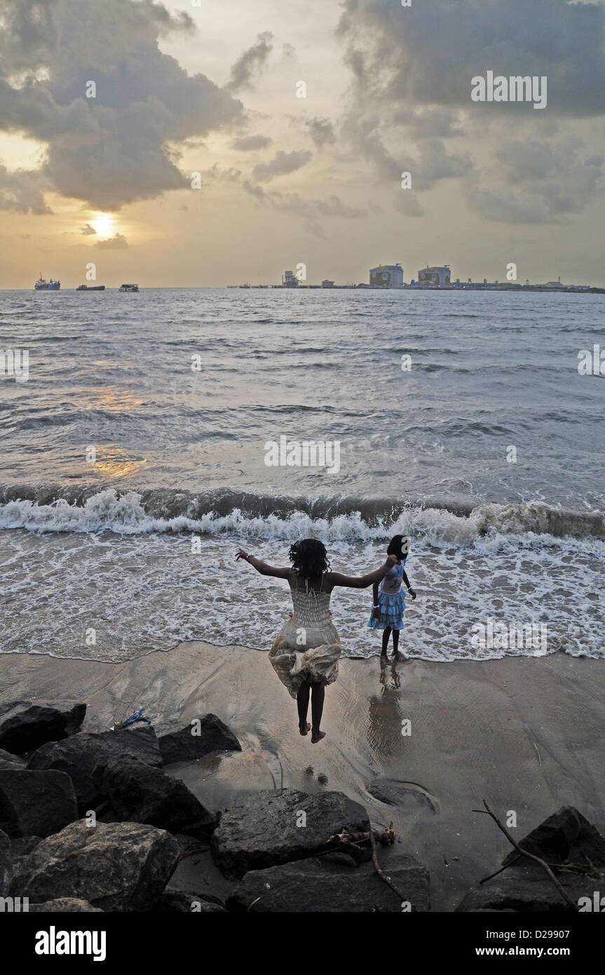 Children playing at seashore Stock Photo - Alamy