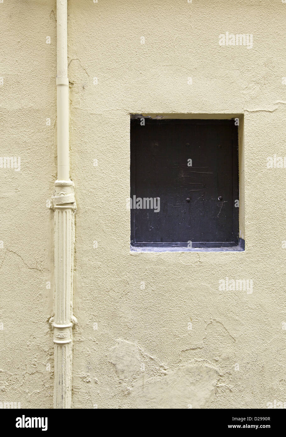 Closed window, wall detail square window, exploration Stock Photo - Alamy