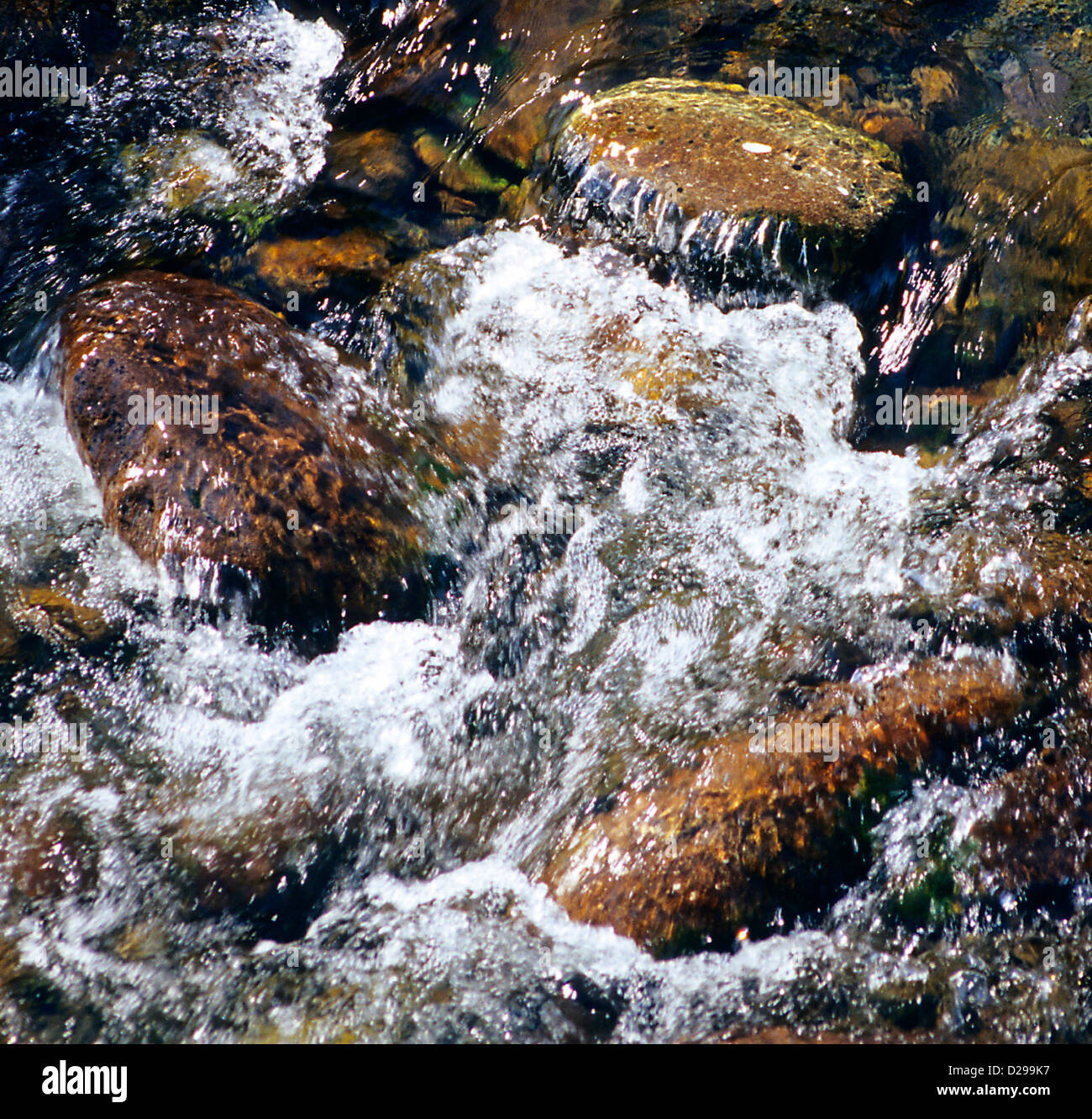 Stream Water Flowing over Rocks Stock Photo - Alamy