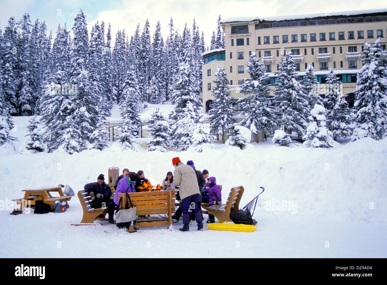 Canada alberta banff warming fire outside lake hi-res stock photography ...