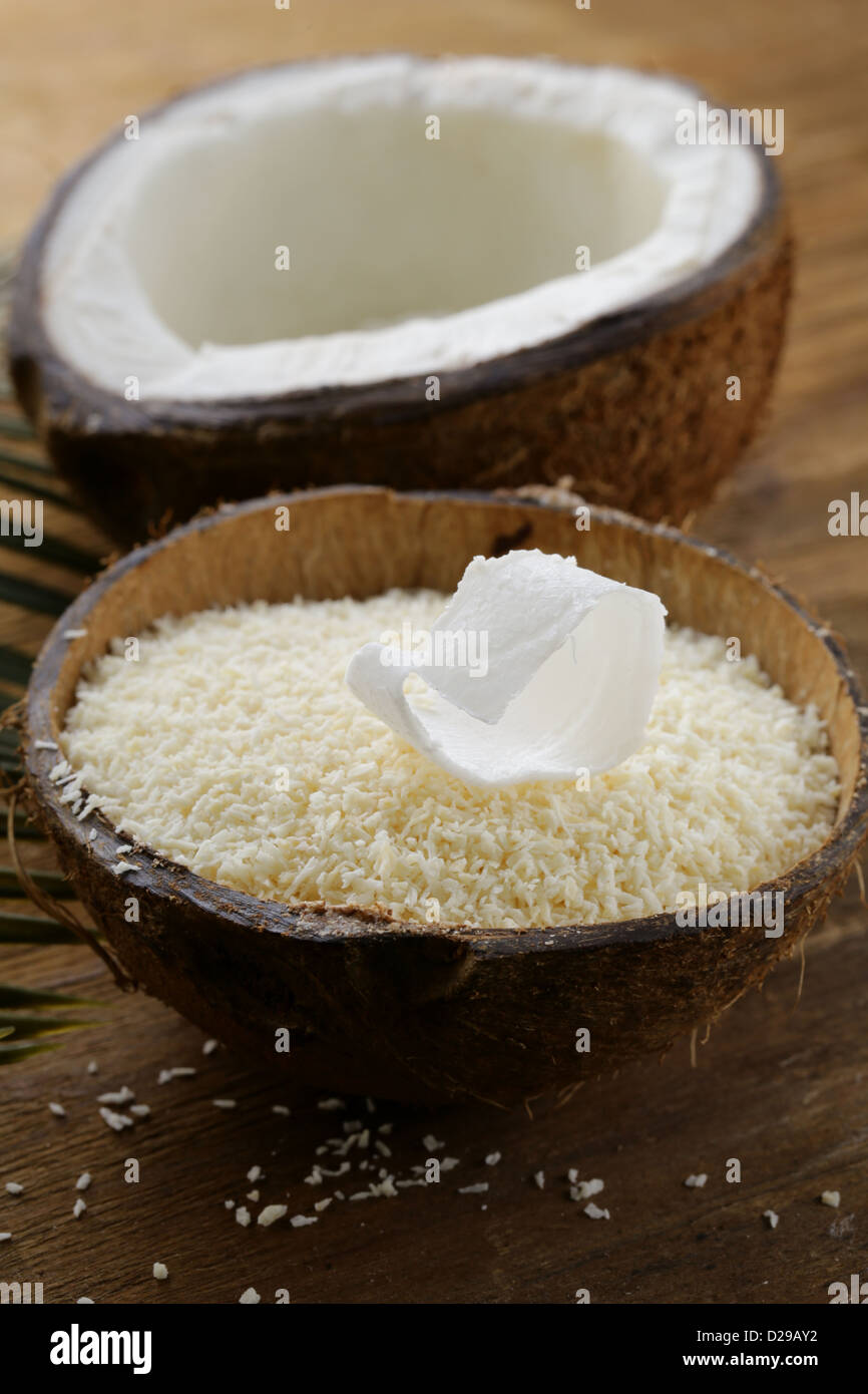 grounded coconut flakes and fresh coconut Stock Photo - Alamy