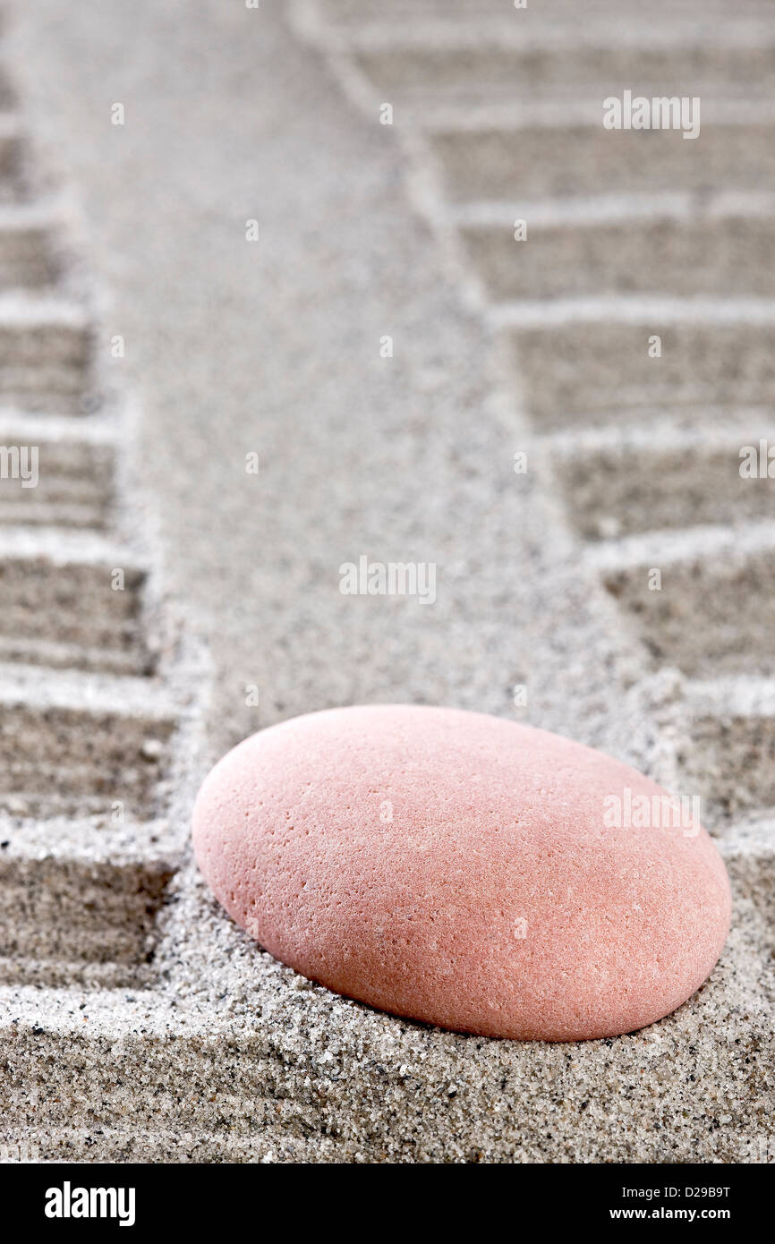 A red walking stone Stock Photo - Alamy