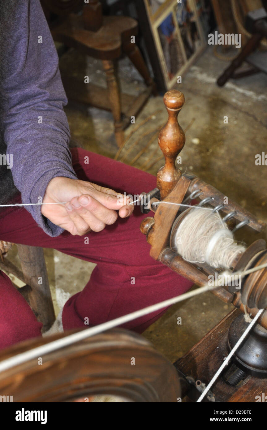 Old Fashioned manual wool spinning wheel Stock Photo - Alamy