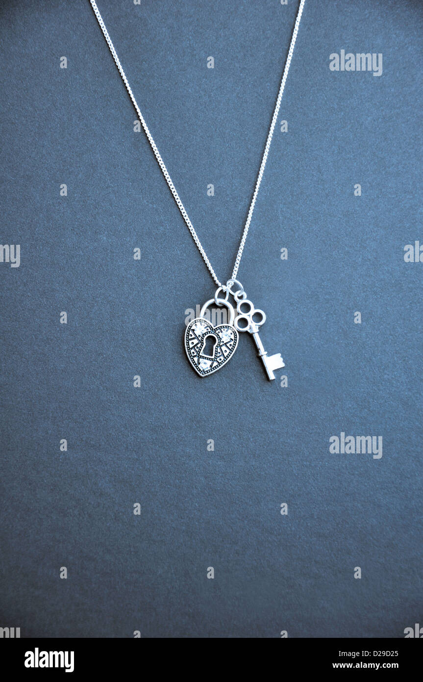 Chain and pendant - lock and key Stock Photo - Alamy