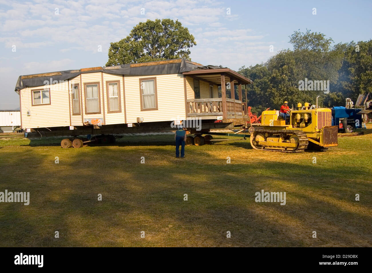 Tractor Moving House Stock Photo - Alamy