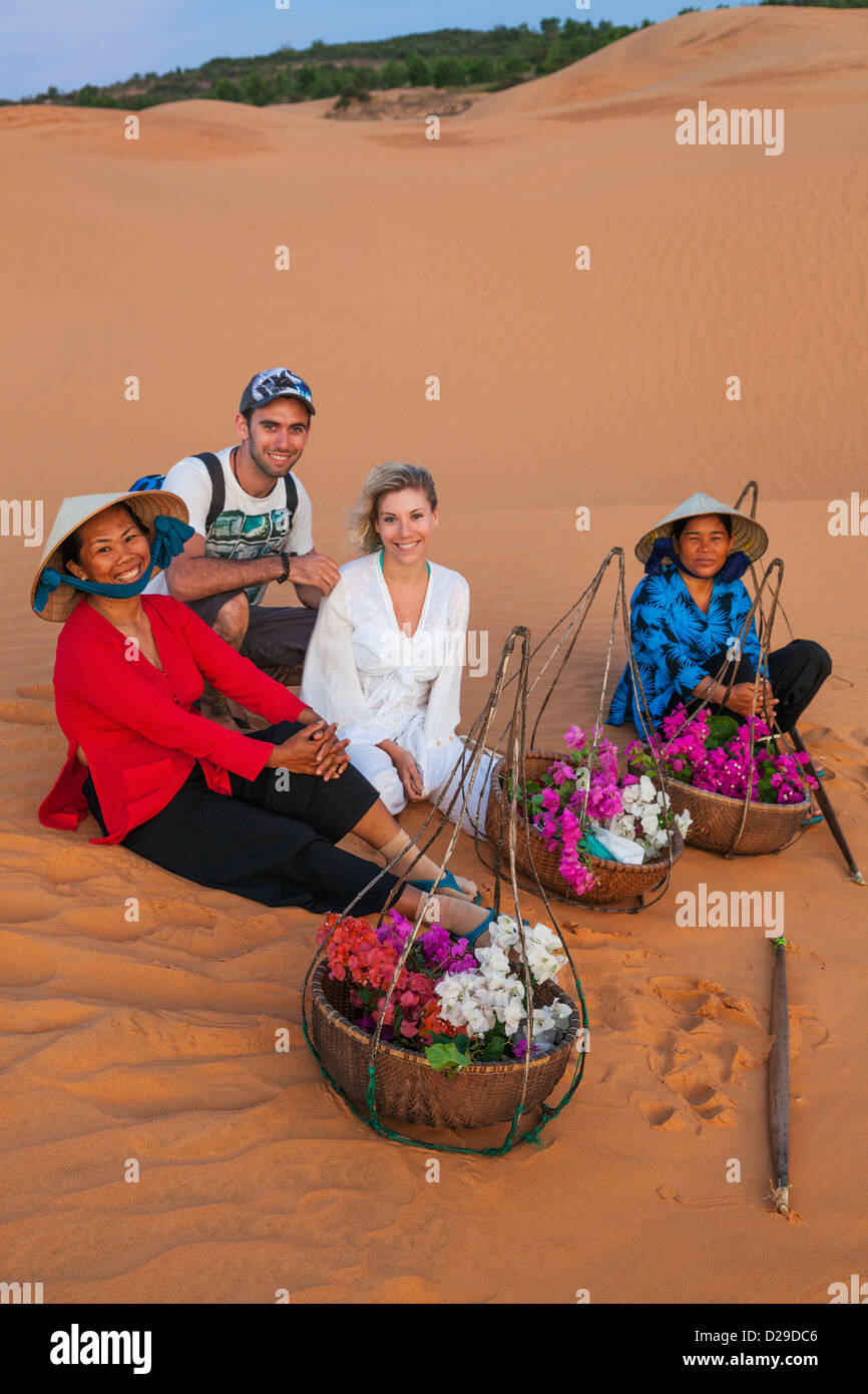 Vietnam, Mui Ne, Sand Dunes, Tourists and Local Women Stock Photo - Alamy