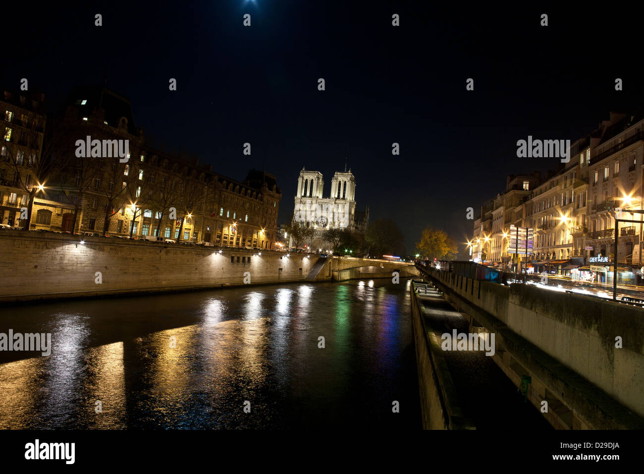 Paris in the latin quarter, view on Notre Dame cathedral at night ...