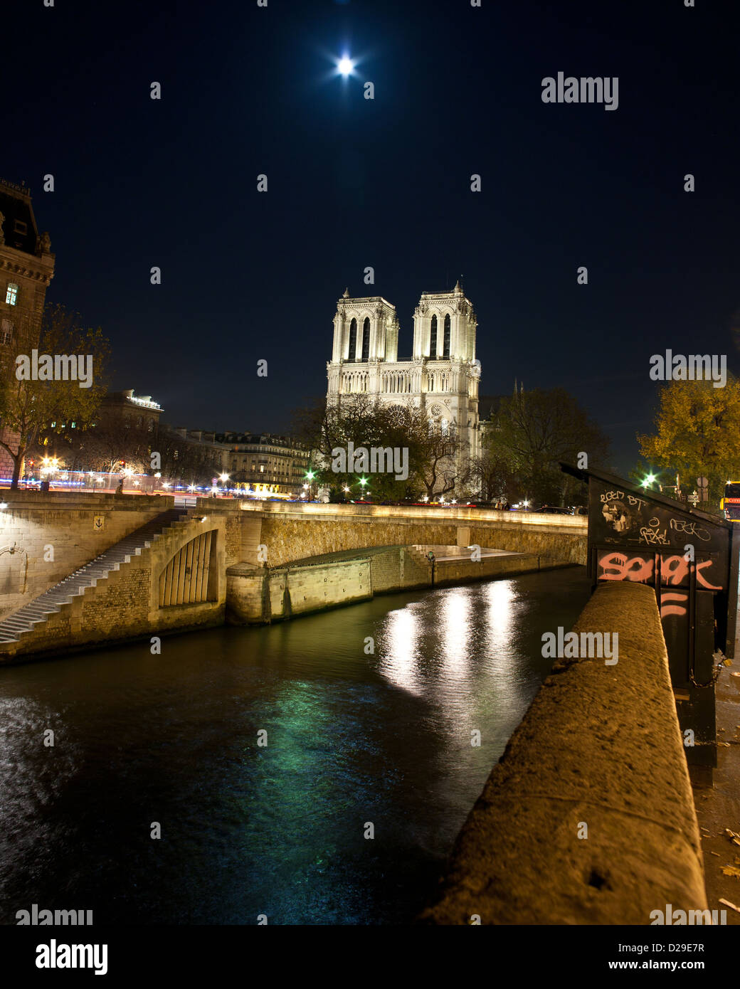 Paris in the latin quarter, view on Notre Dame cathedral at night ...
