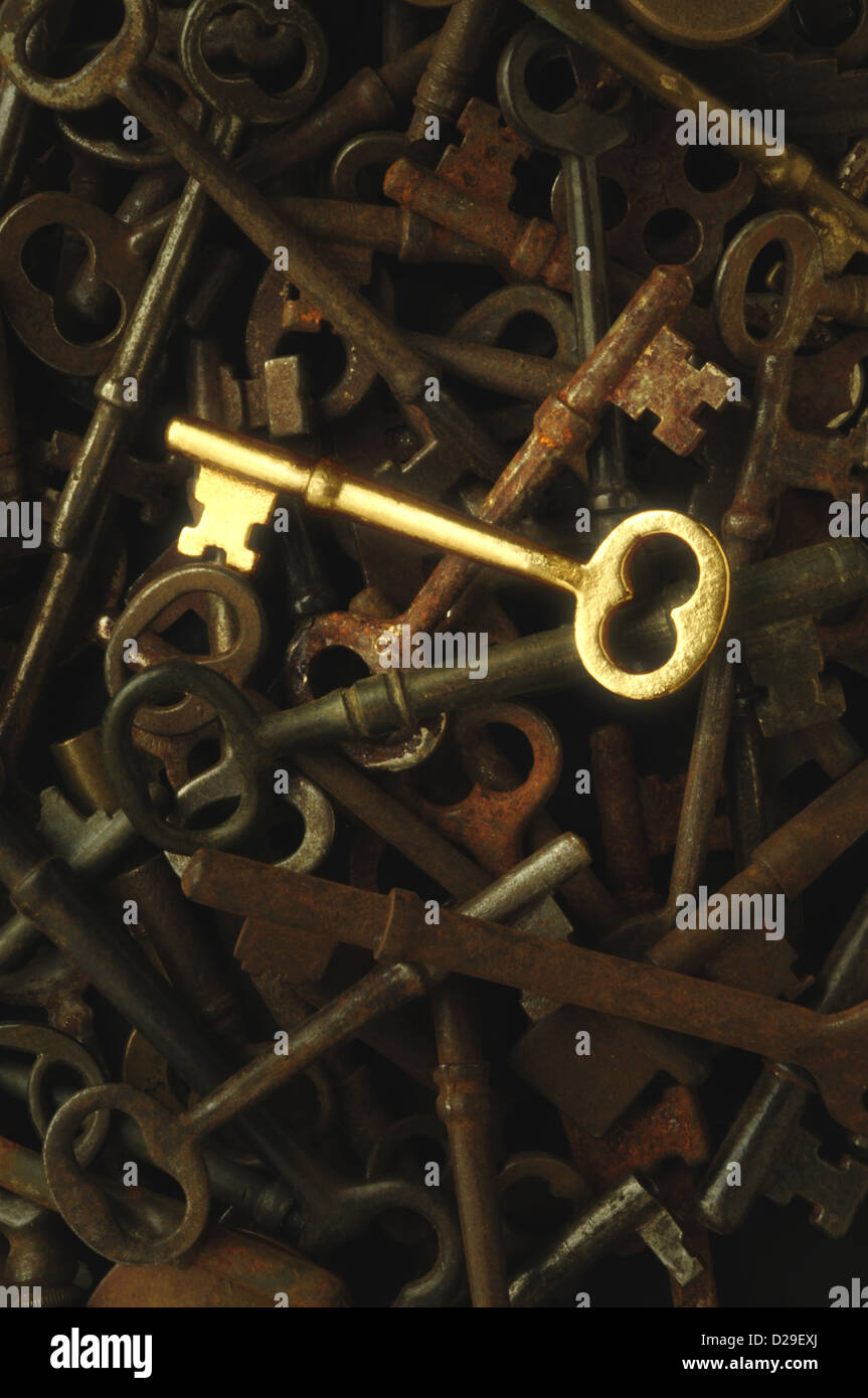 Glowing gold skeleton key Stock Photo - Alamy