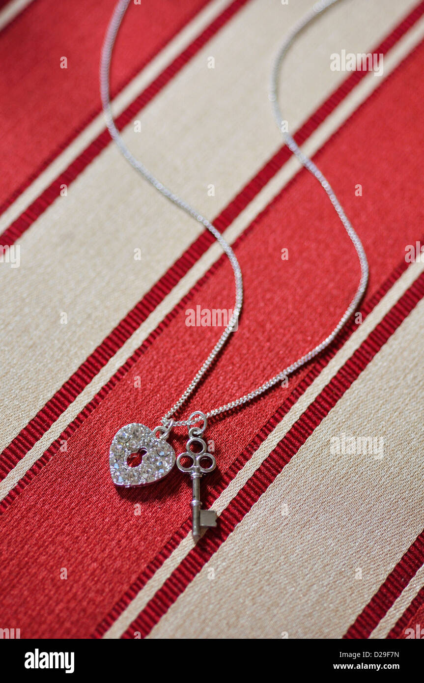 Chain and pendant - lock and key Stock Photo - Alamy