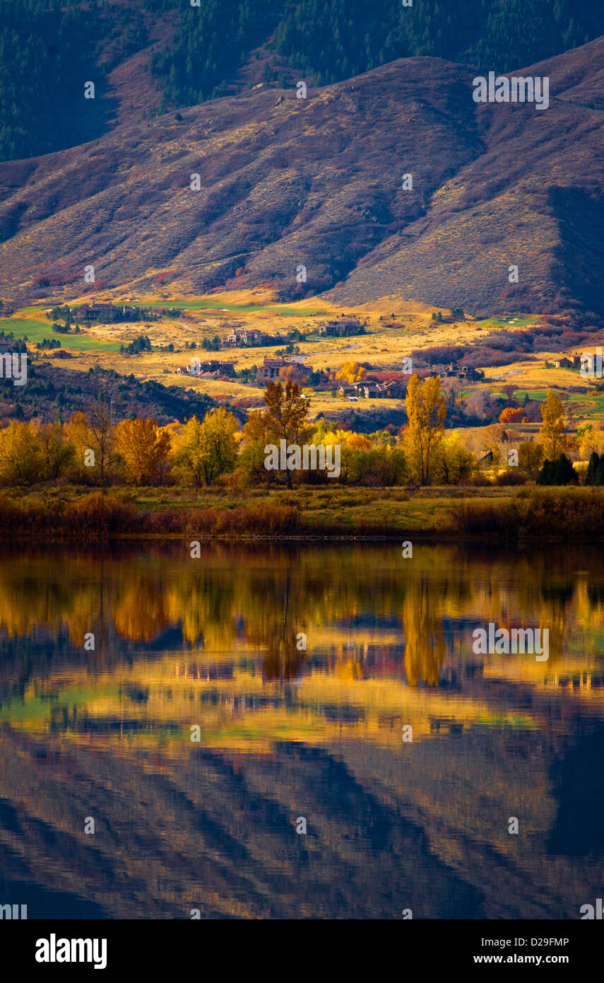 The landscape reflects in the gravel ponds at Chatfield State Park ...