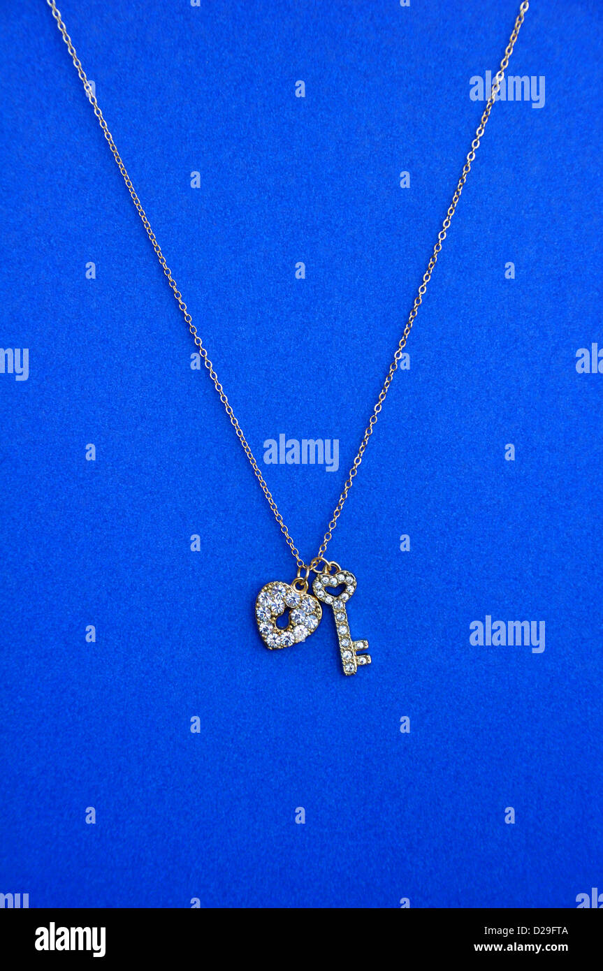 Chain and pendant - lock and key Stock Photo - Alamy