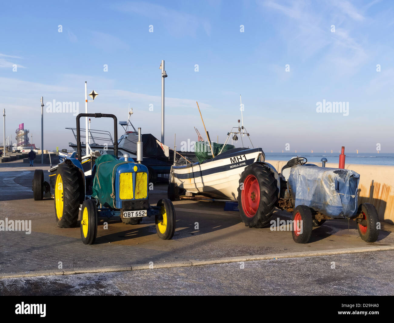 Inshore fishing boats and tractors on their new hard standing area on ...