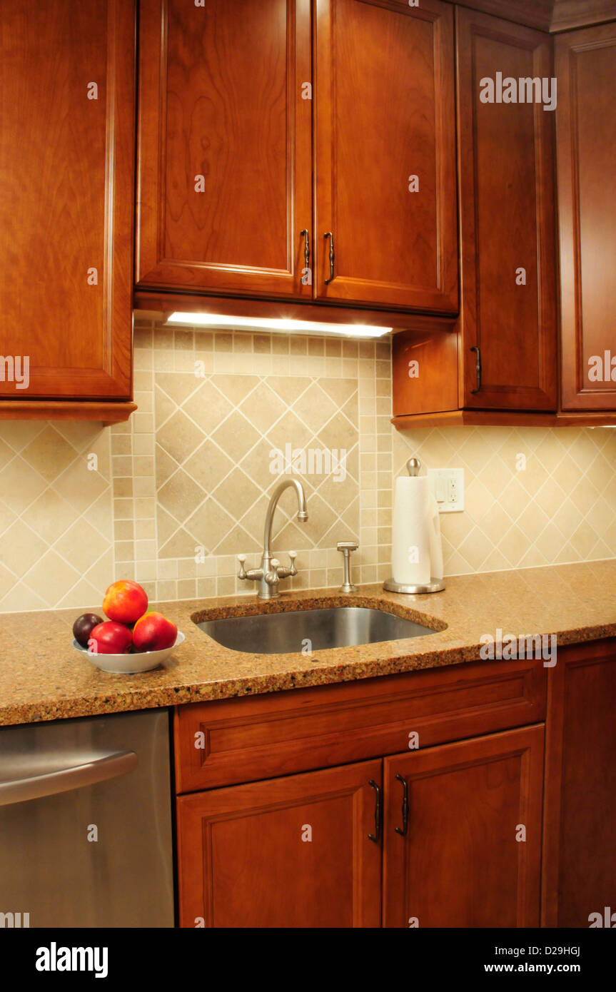 Stainless steel sink in a remodeled hi-res stock photography and images ...