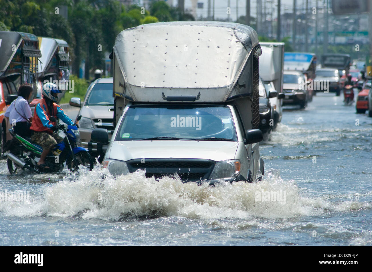 Cars flooded road hi-res stock photography and images - Alamy